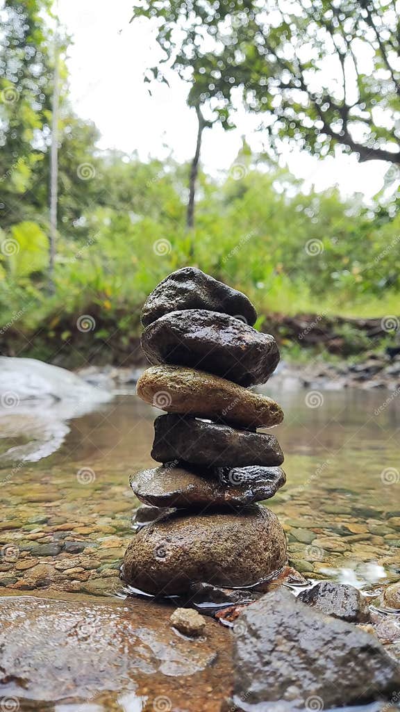 Rock Stacking in River stock photo. Image of nature - 261825632