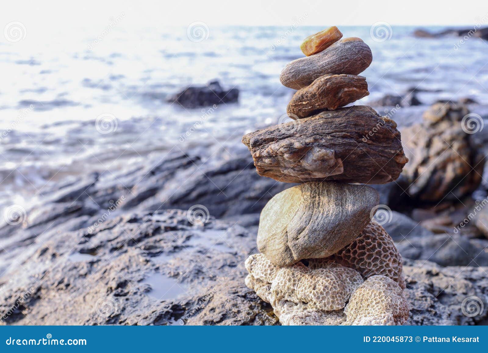 Rock stacks on the beach stock image. Image of beach - 220045873
