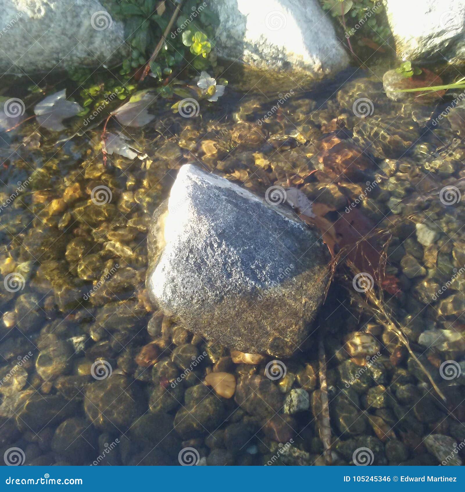 A Rock Stands Amid a Flowing Stream Stock Photo - Image of erode, water ...