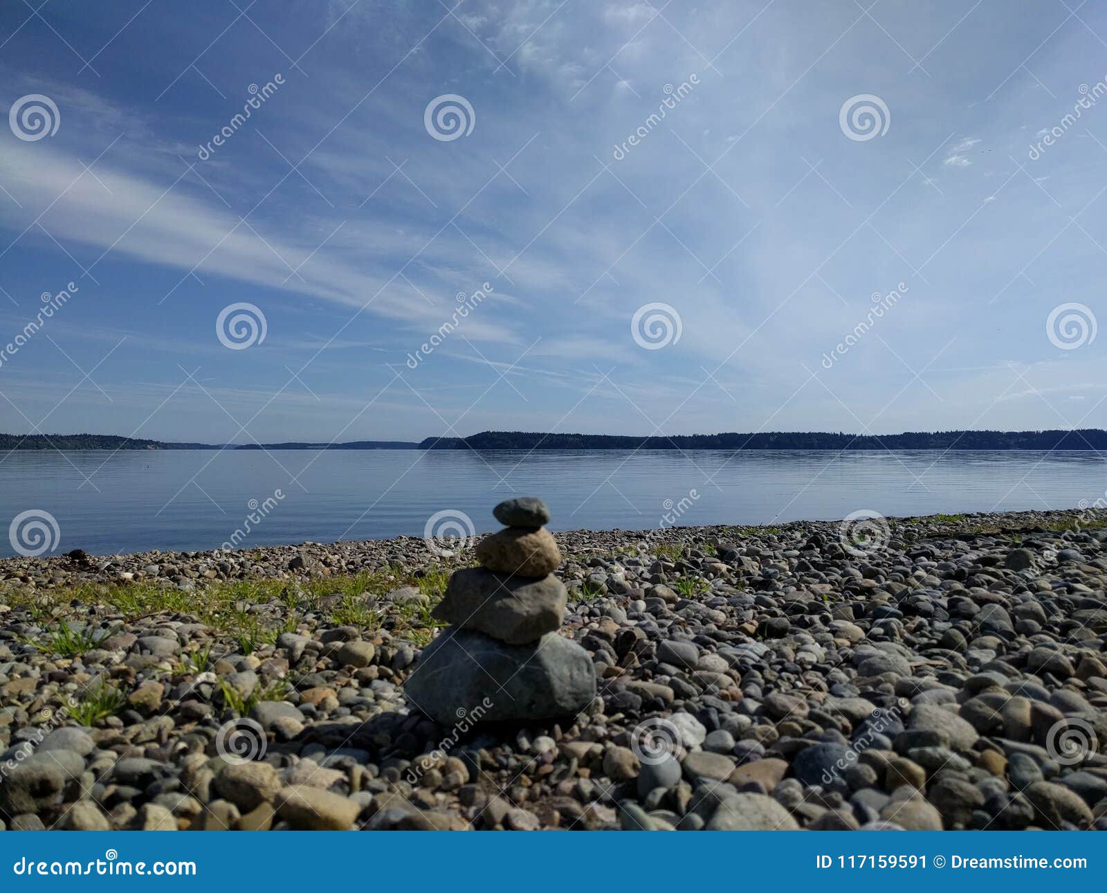 Rock statue on beach stock image. Image of stacked, form - 117159591