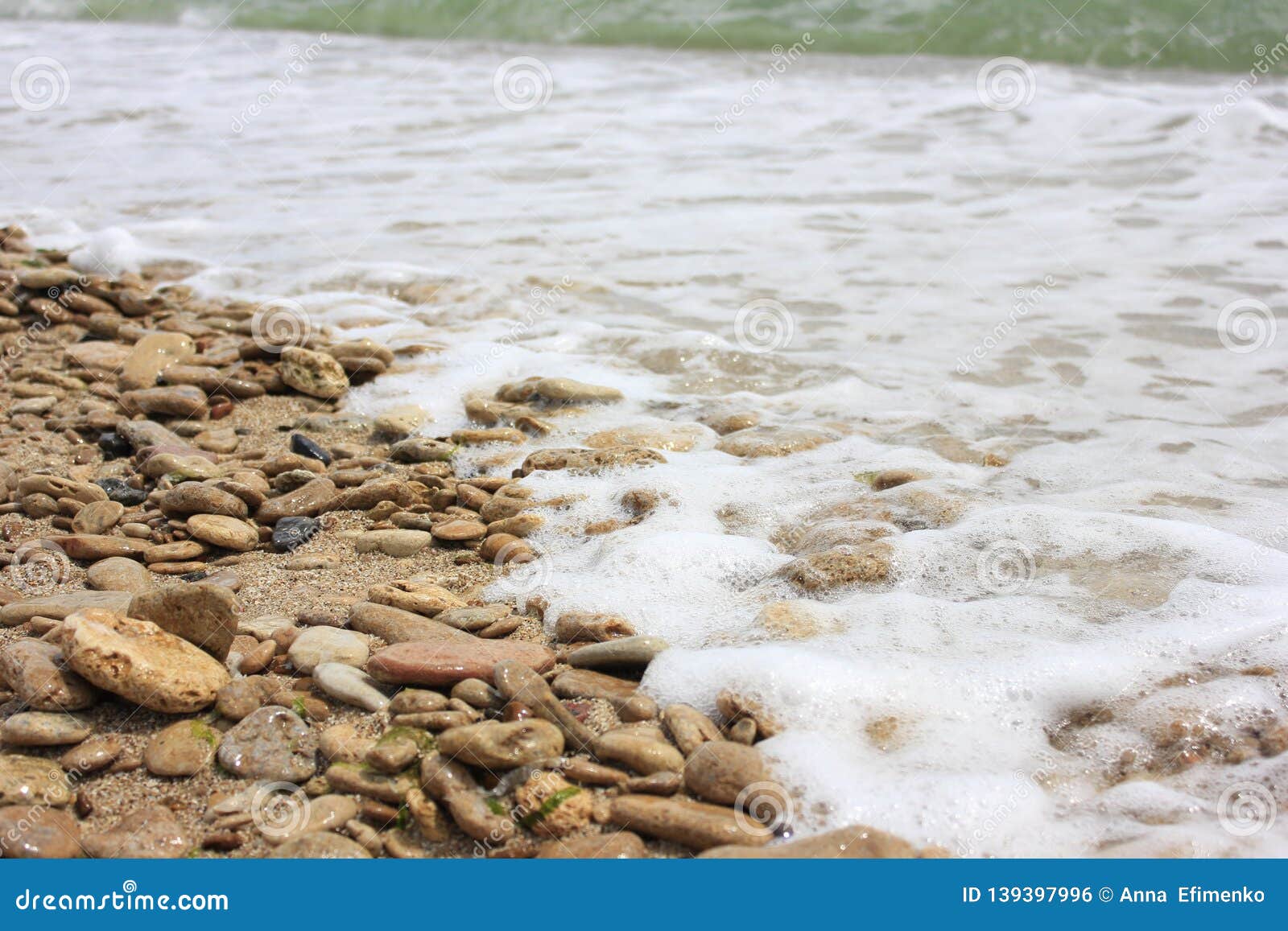 Stones washed by sea waves stock photo. Image of minerals - 139397996
