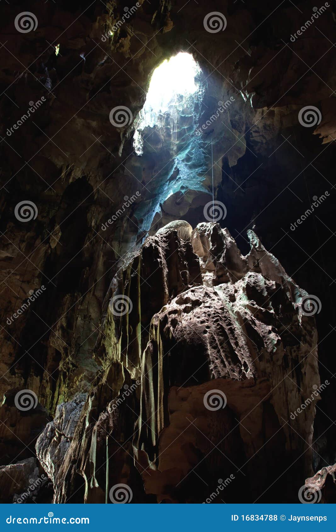 Cracks And Caves Caused By Erosion In The Red Sandstone Buttes Of ...
