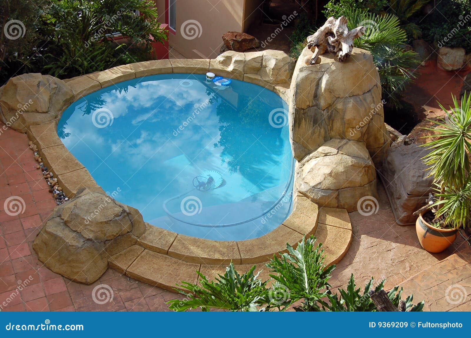 Rock Style Swimming Pool stock image. Image of lifestyle - 9369209