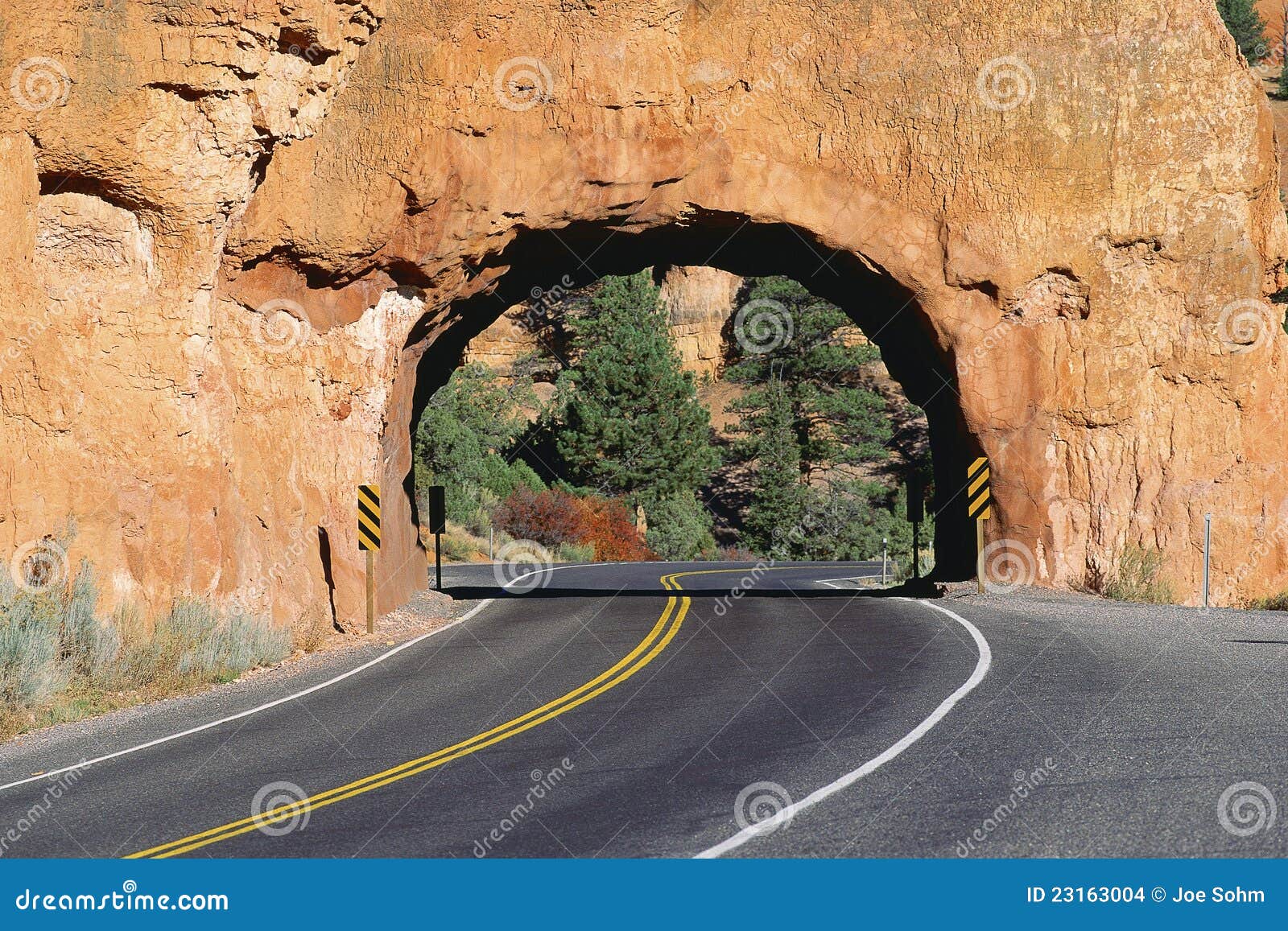 Rock tunnel on highway stock photo. Image of desert, highways - 23163004