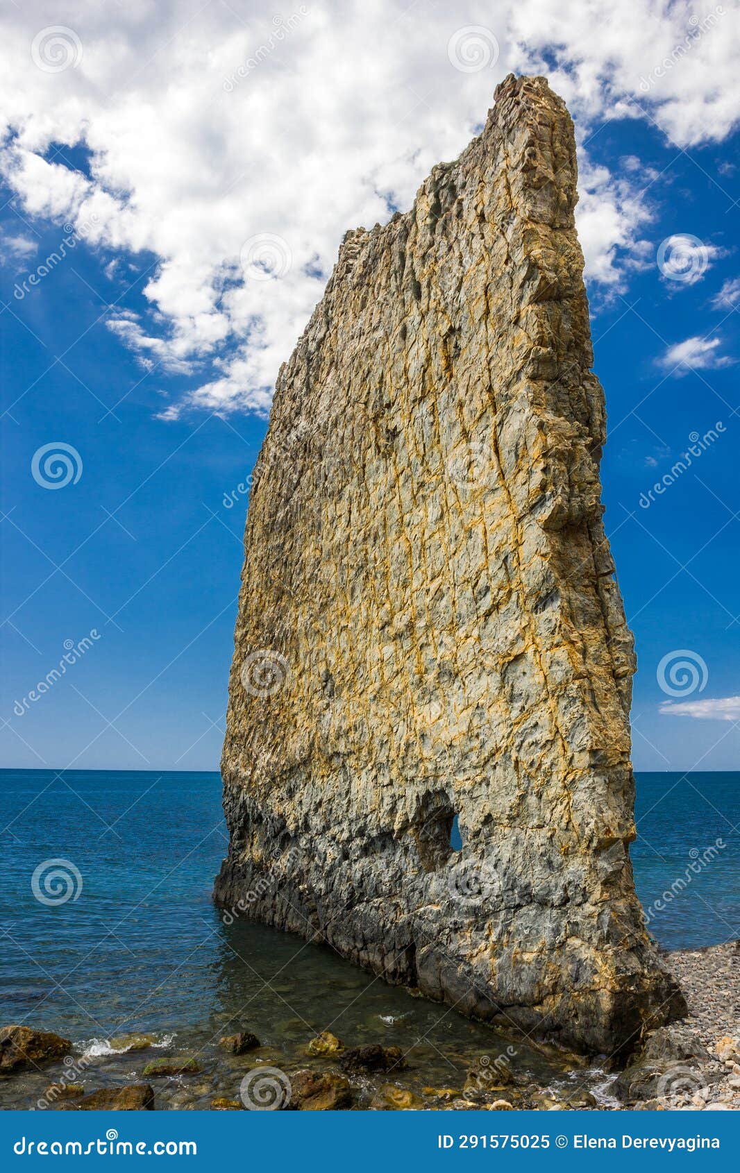 Rock of Unusual Shape on Sea Shore, Stones, Vertical Frame Stock Image ...