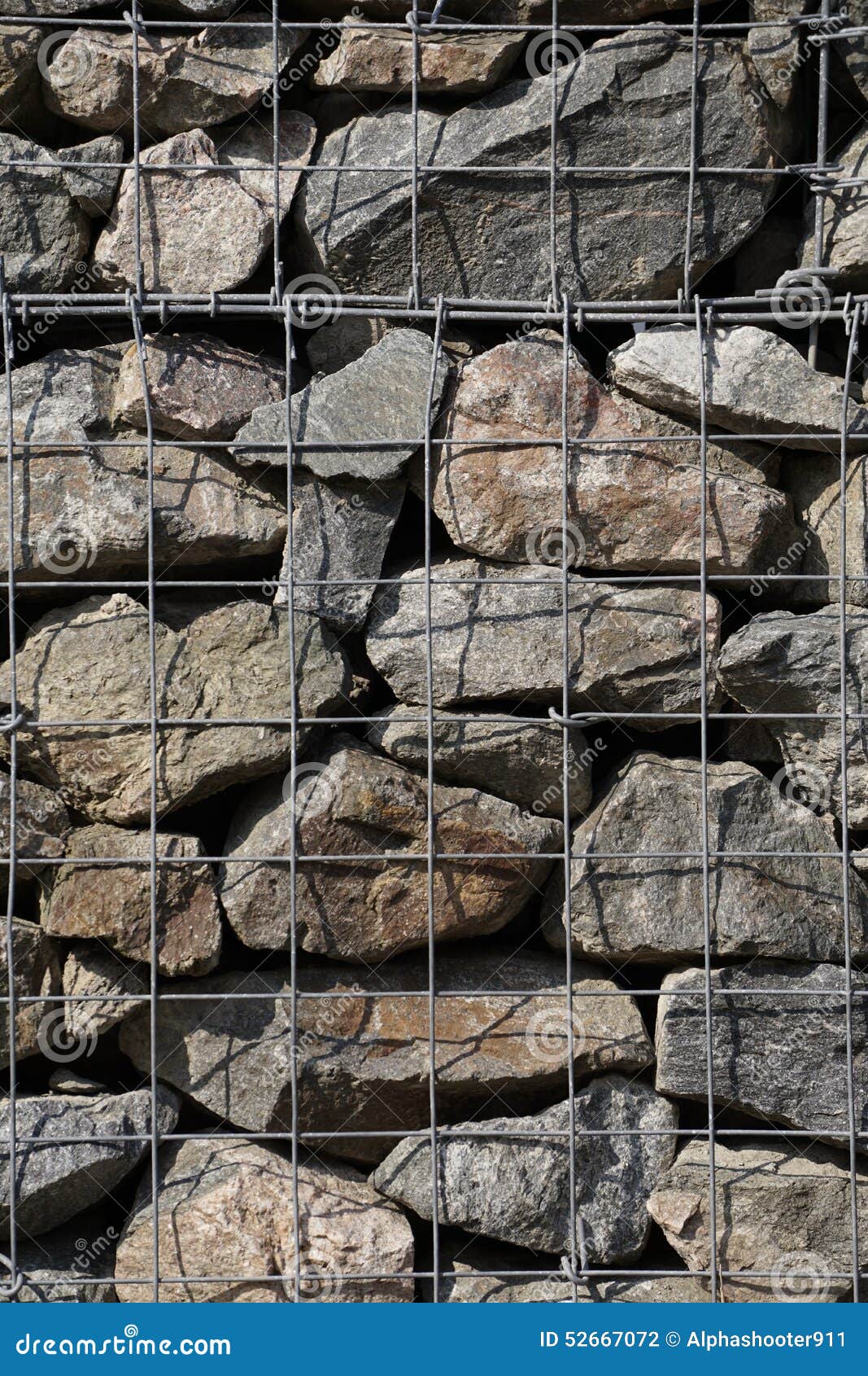 Rock wall stock photo. Image of steel, rocks, steal, wire - 52667072