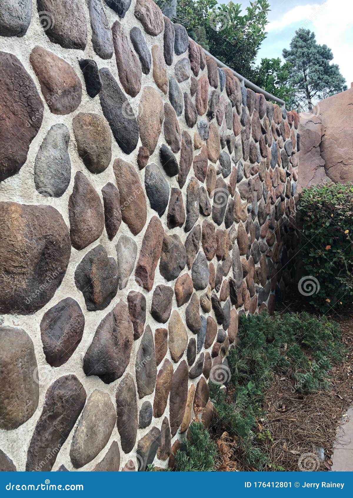 Rock wall with cement stock image. Image of strength - 176412801