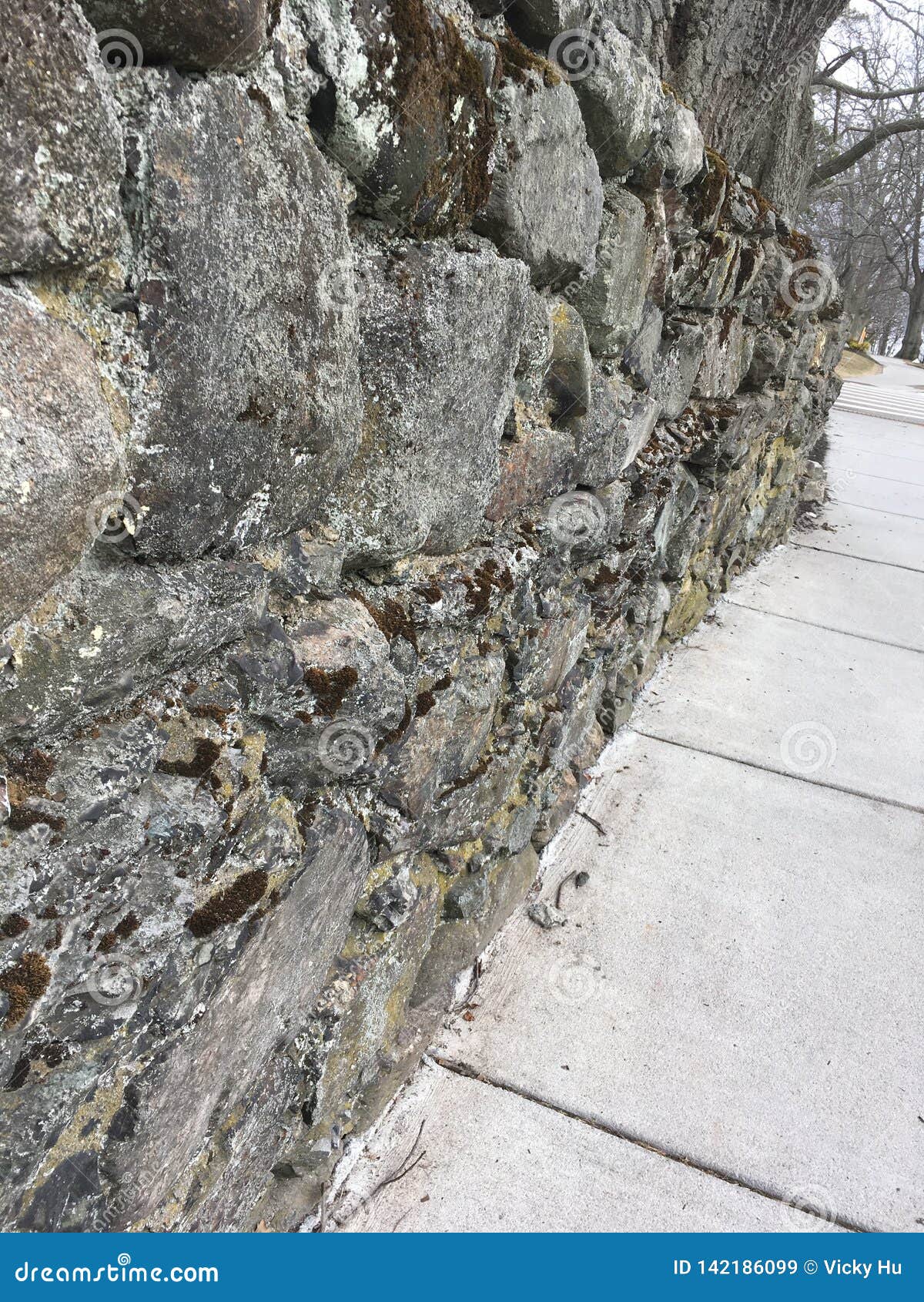 Rock wall stock image. Image of road, wall, natural - 142186099