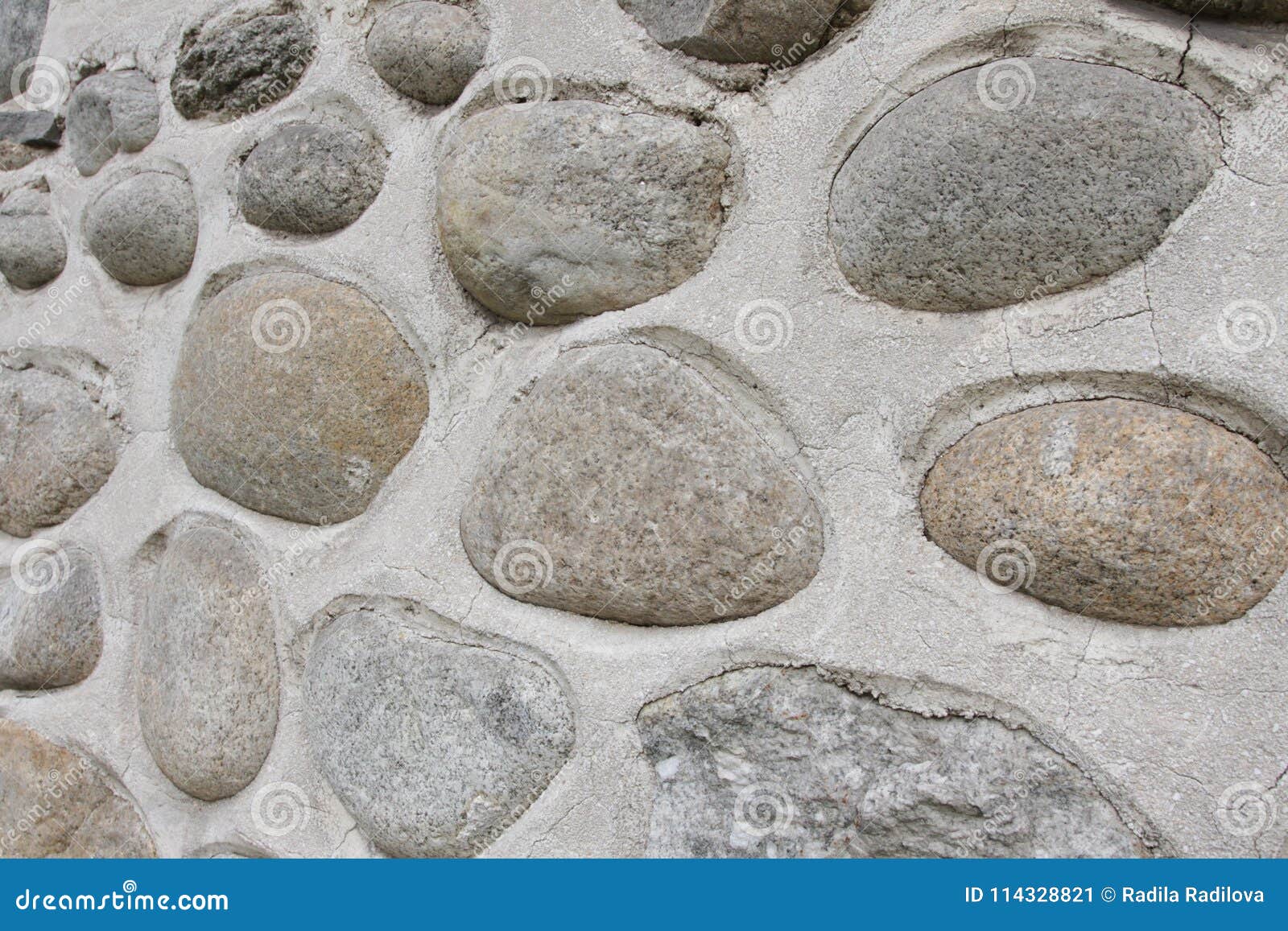 Rock Wall of Natural River Stones. Round Stones Wall Background. River ...