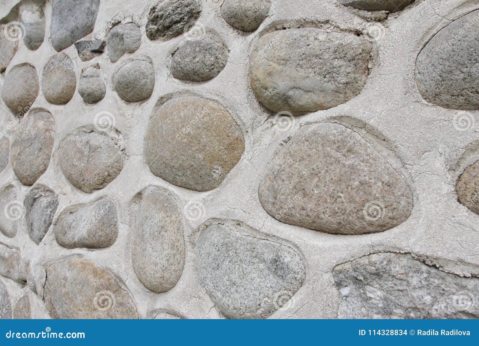 Rock Wall of Natural River Stones. Round Stones Wall Background. River ...