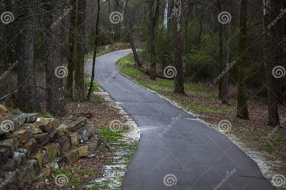 Rock wall and path stock image. Image of green, outside - 256022521