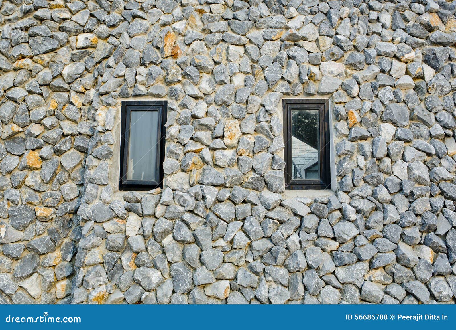 Rock Wall with Two Narrow Windows Stock Photo - Image of multistory ...