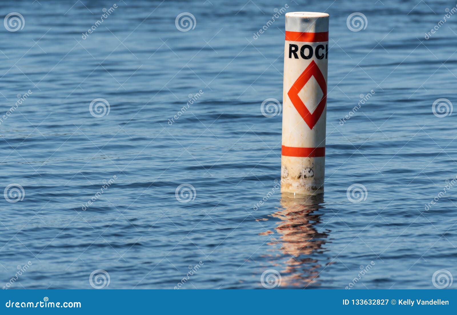 Rock Warning Sign Painted on Buoy Stock Image - Image of nature, blue ...