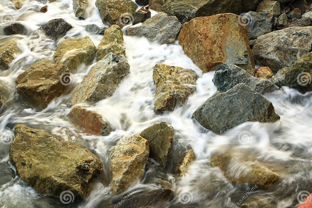 Rock and water stock image. Image of boulder, water, rock - 37133487