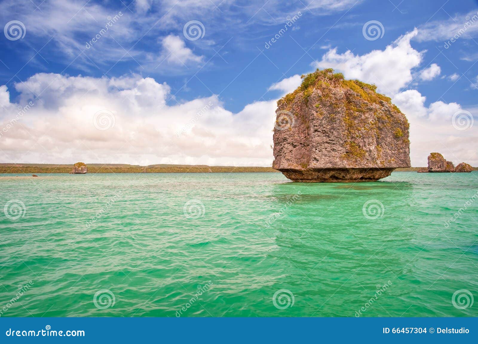 Rock in the Water, Isle of Pines Stock Photo - Image of pins, sand ...