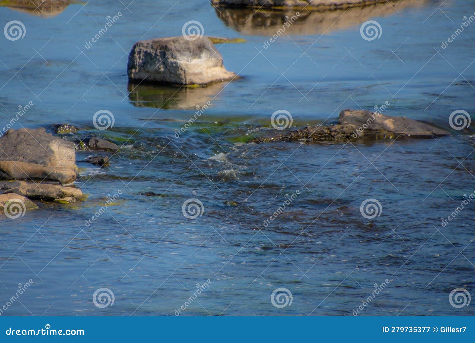 Rock at Water Level in a River Stock Image - Image of rocky, vacation ...