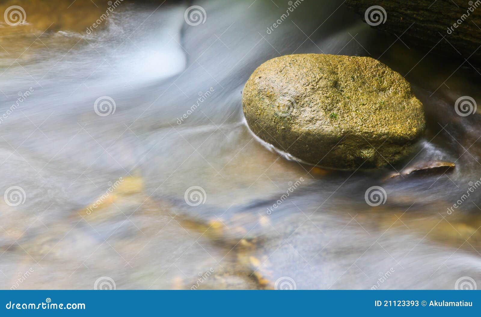A rock with water motion stock image. Image of areuse - 21123393