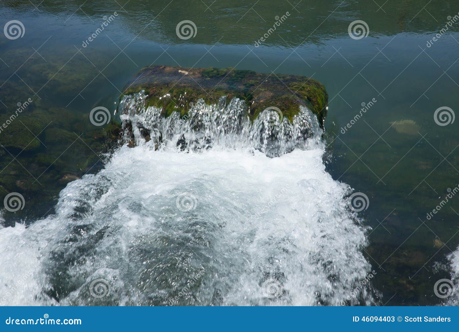 Rock in Water stock image. Image of rushing, rock, outside - 46094403