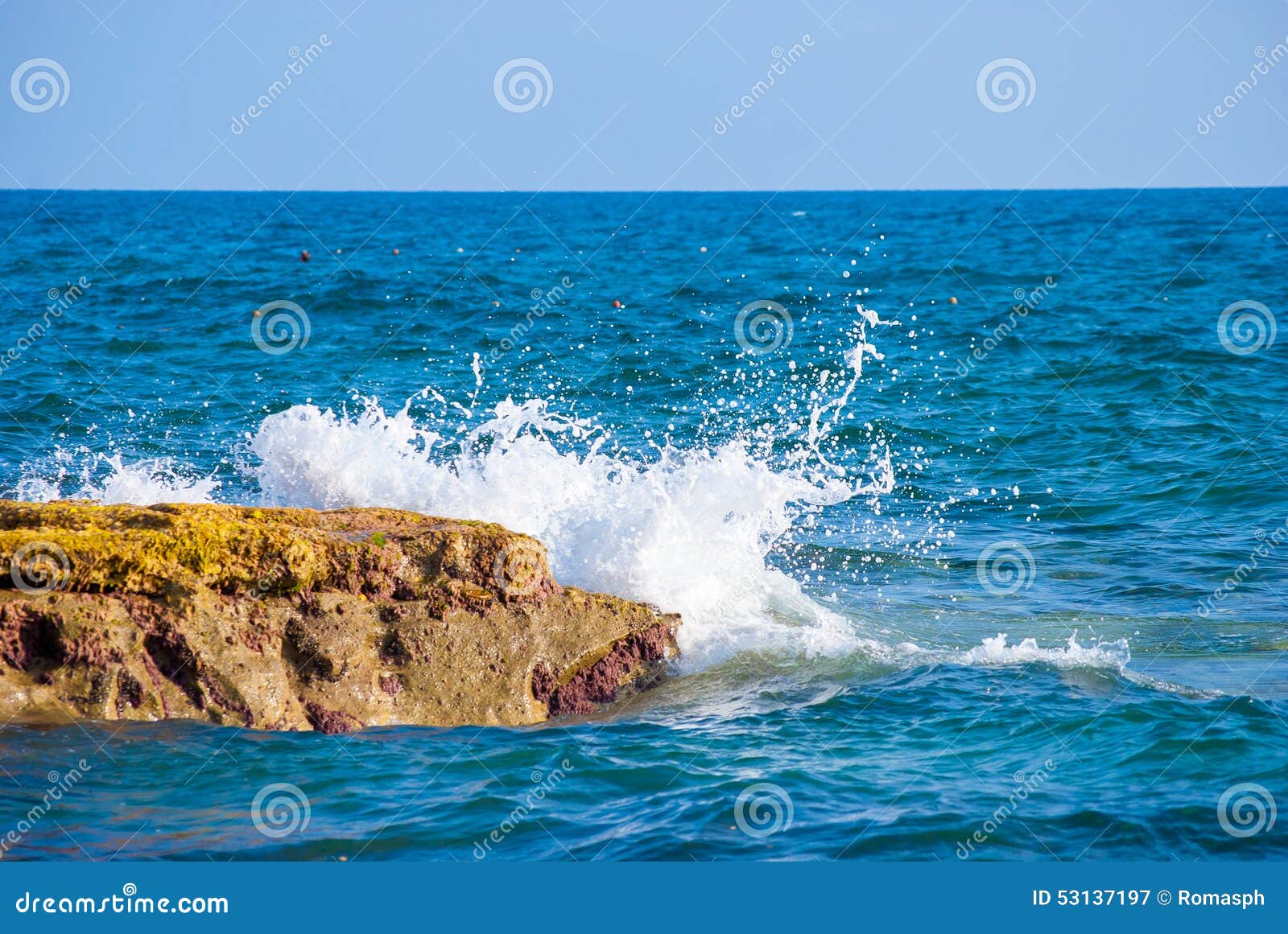 Rock and waves in sea stock image. Image of foam, clean - 53137197