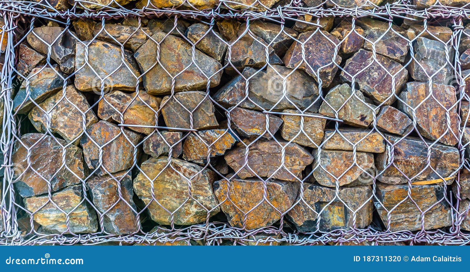 A Rock and Wire Wall Texture Stock Photo - Image of castle, mortar ...