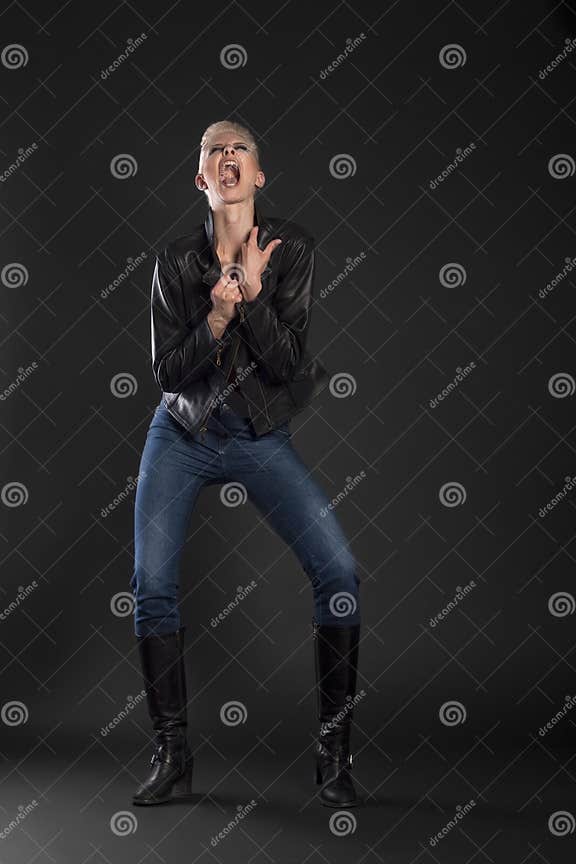 Rocker blond lady yelling stock image. Image of female - 19919059