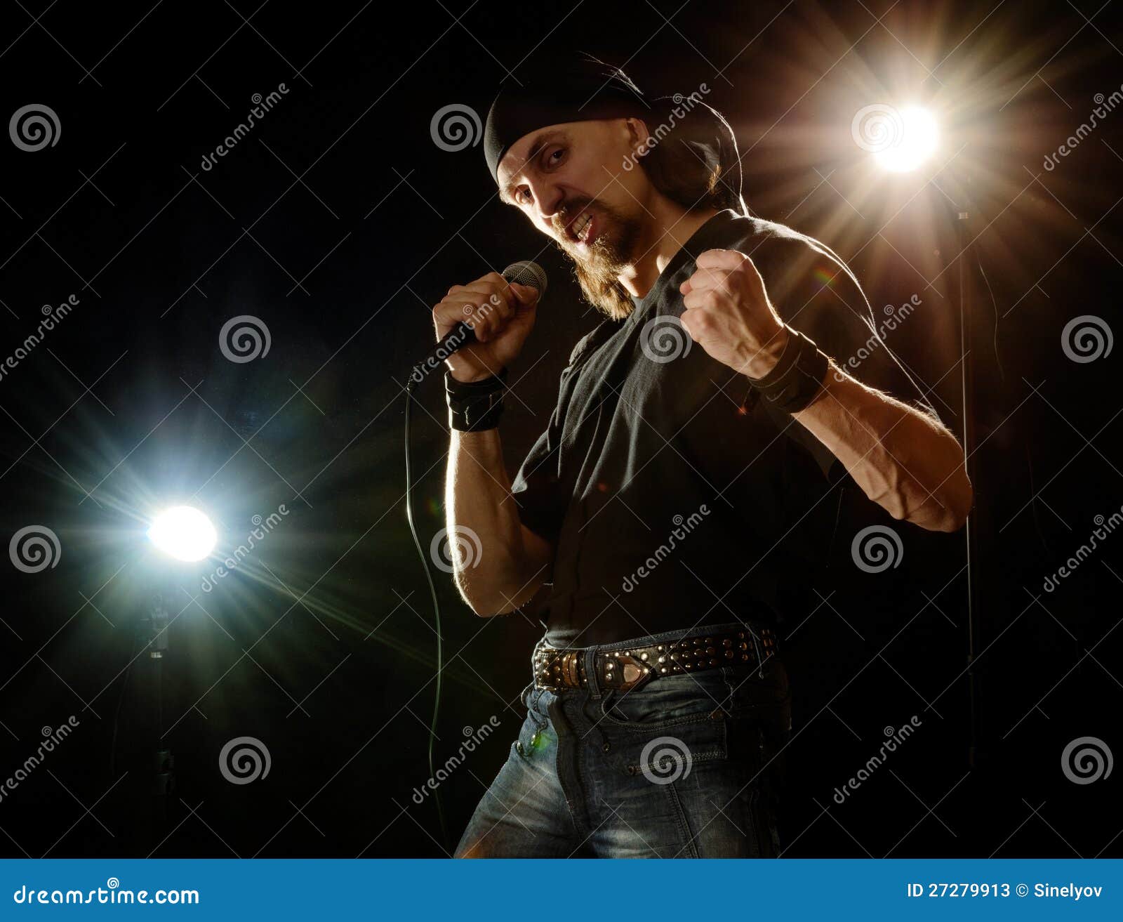 Rocker with Mike Clenching His Fist Stock Image - Image of performer ...
