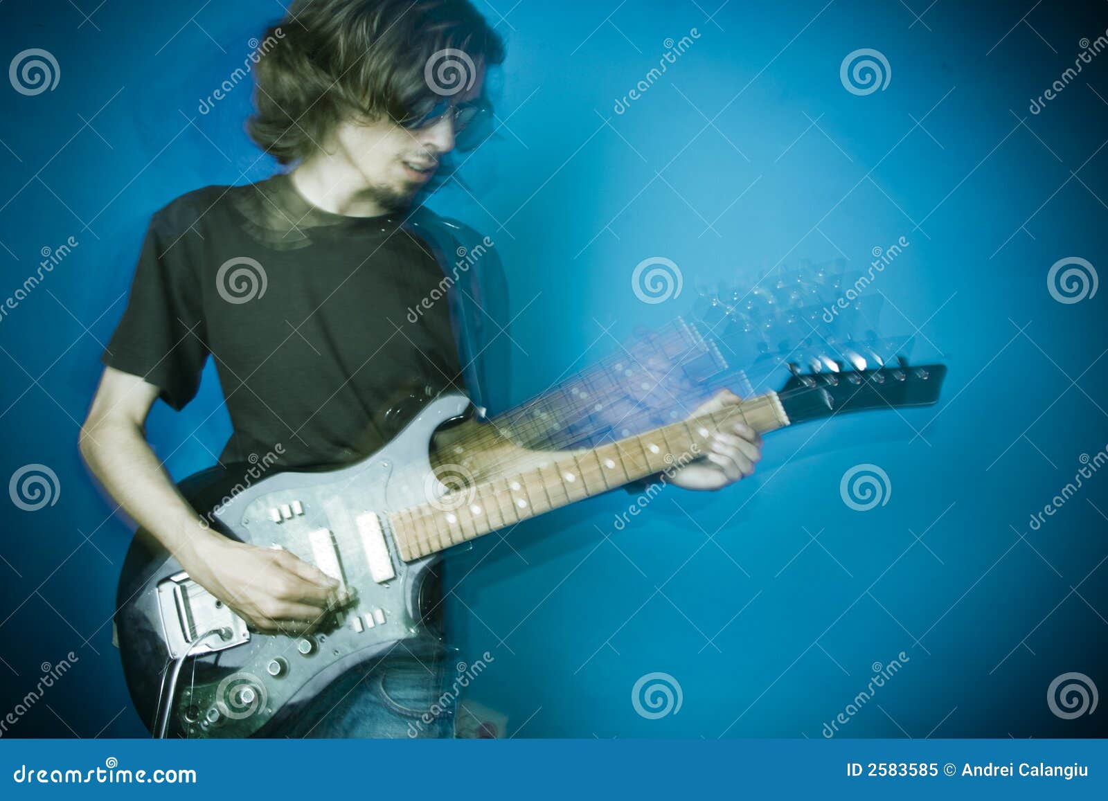 Rocker Playing Guitar on Blue Stock Image - Image of performer, string ...