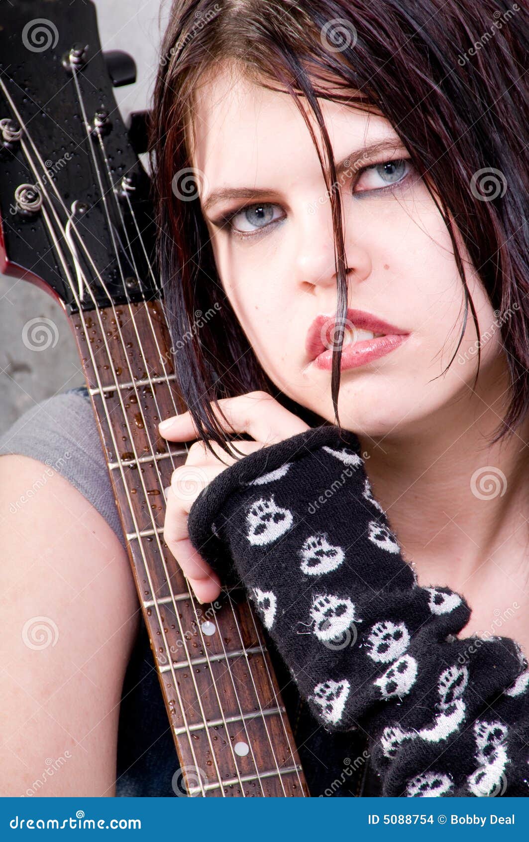 Rocker in the Rain stock photo. Image of electric, belt - 5088754