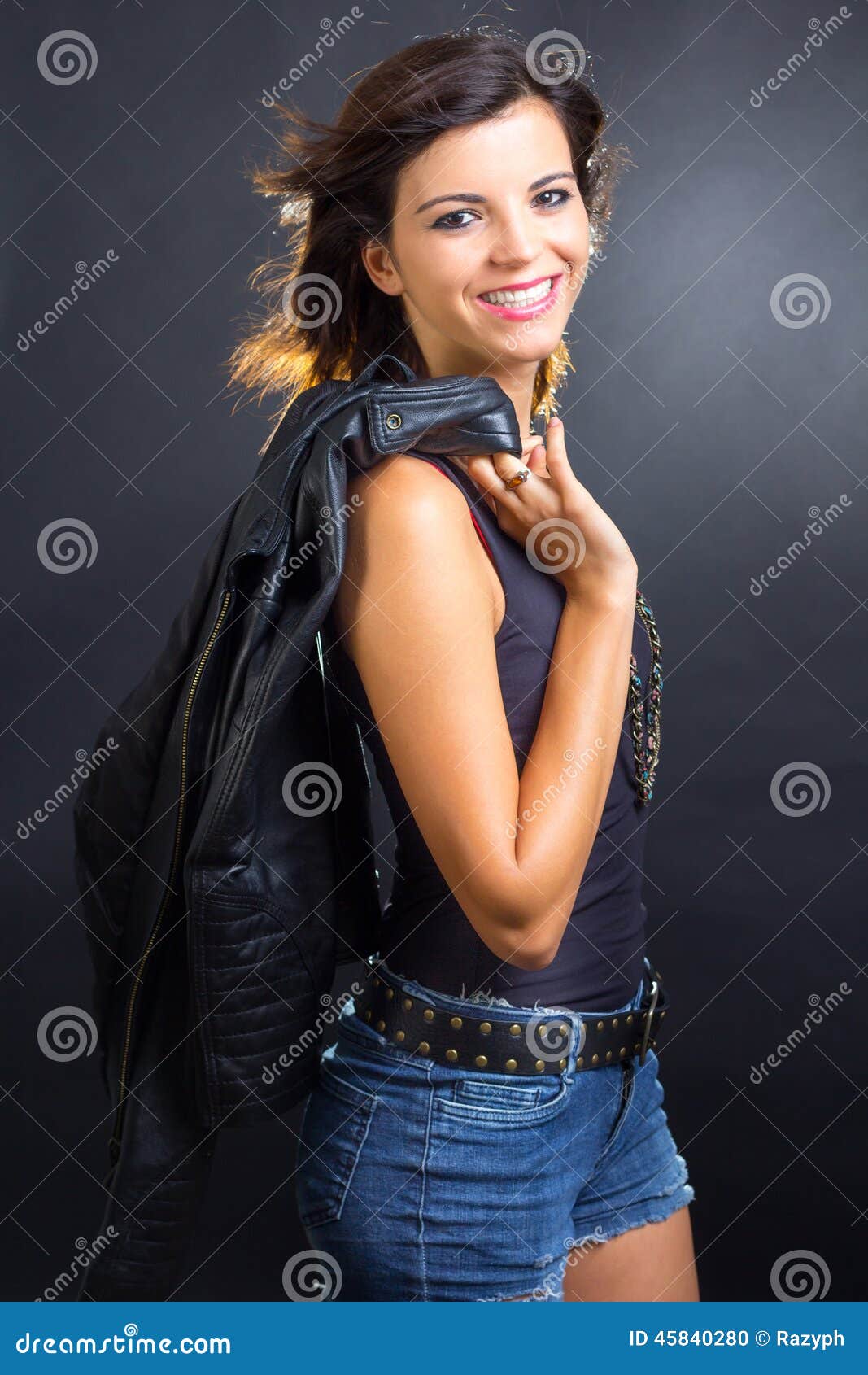 Rocker s smile stock photo. Image of brunette, jeans - 45840280