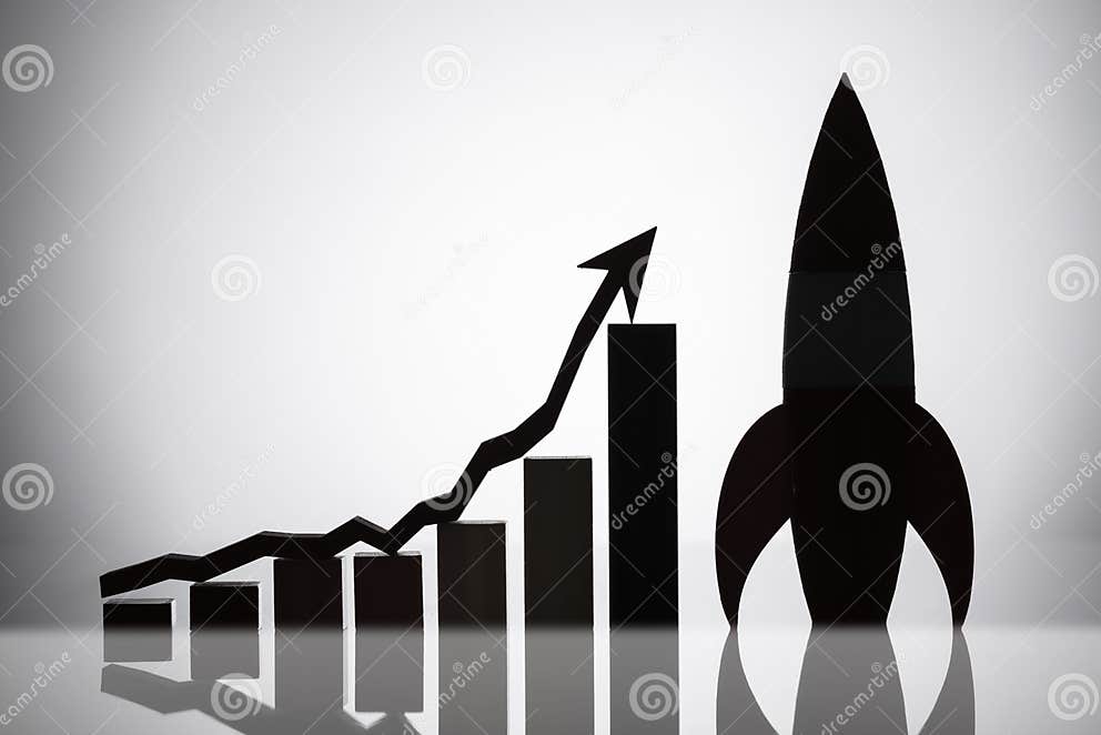 Rocket Besides Graph with an Arrow Moving in Upward Direction Stock ...