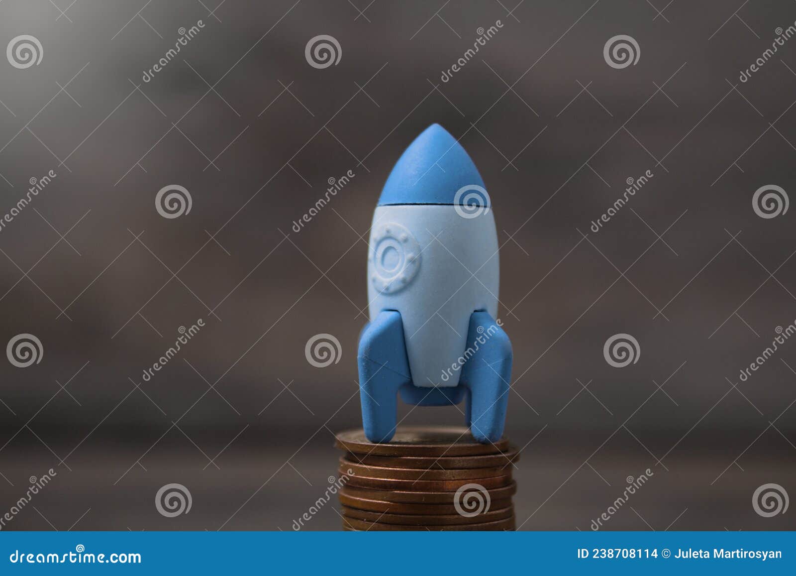 Rocket on Coins. Concept Startup Stock Photo - Image of start ...