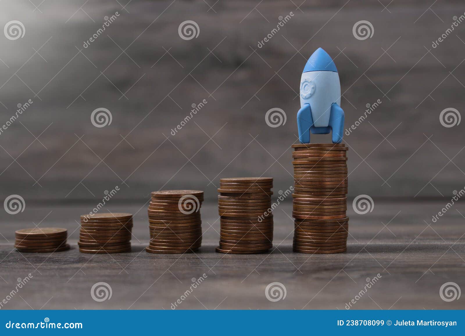 Rocket on Coins in the Form of a Graph Stock Image - Image of coins ...