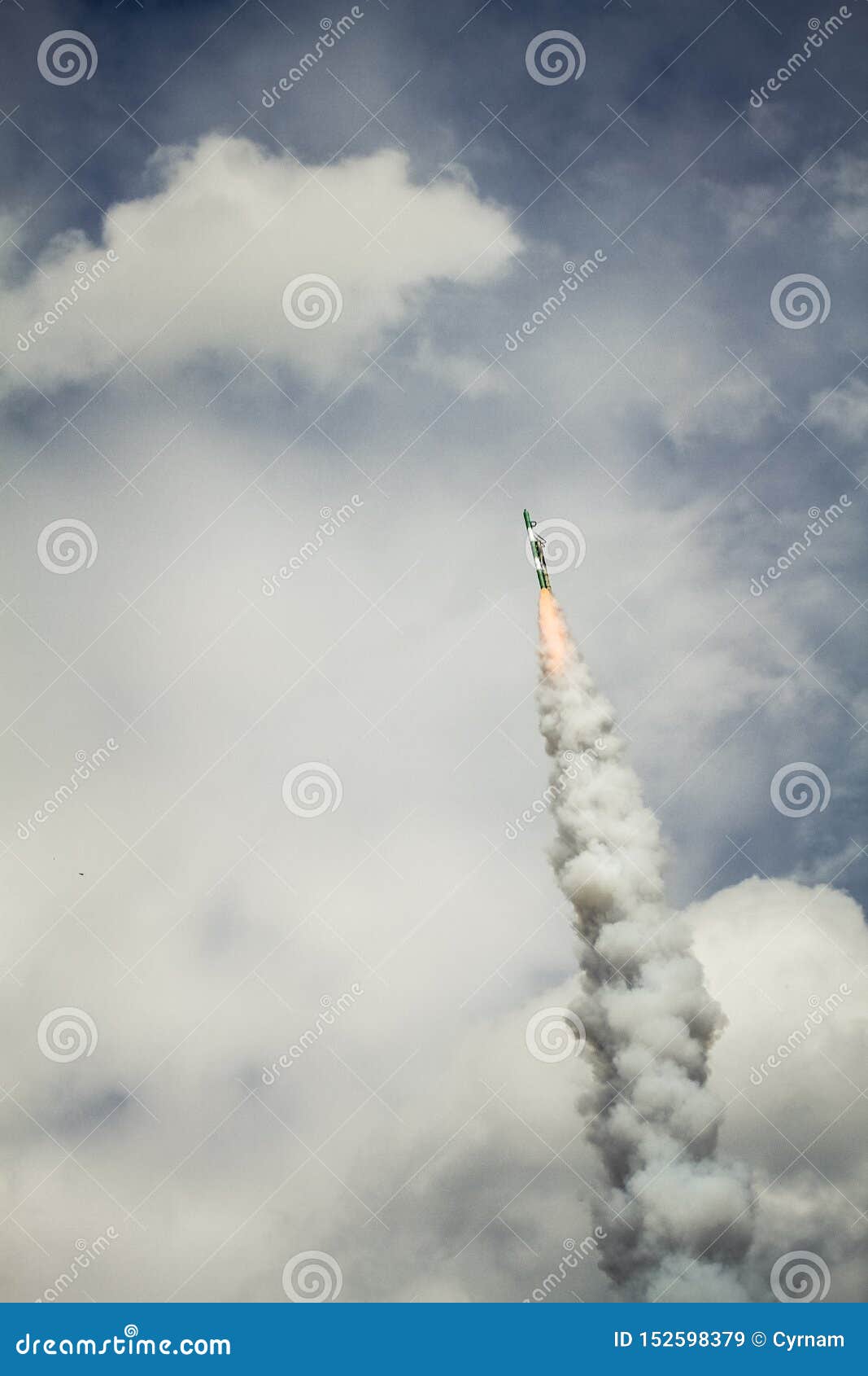 Rocket Fire in cloudy sky stock image. Image of bomb - 152598379