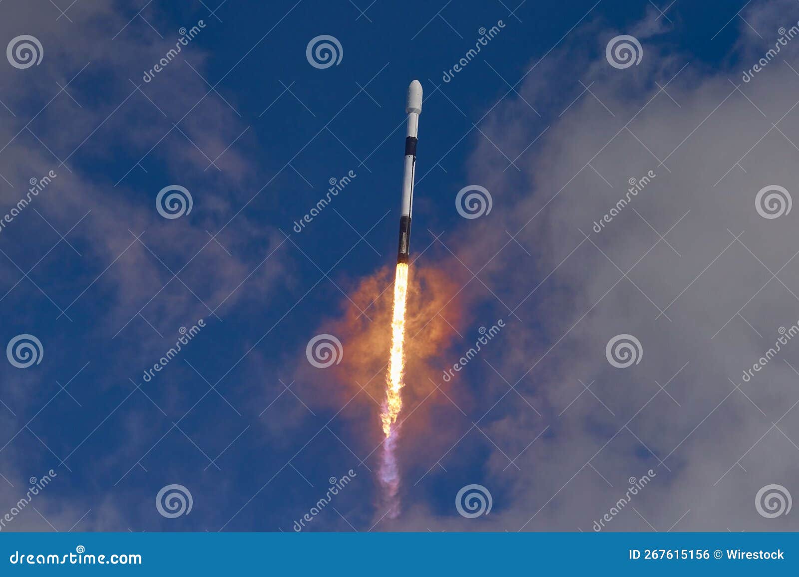 Rocket Flying in the Night Sky with White Clouds Stock Photo - Image of ...