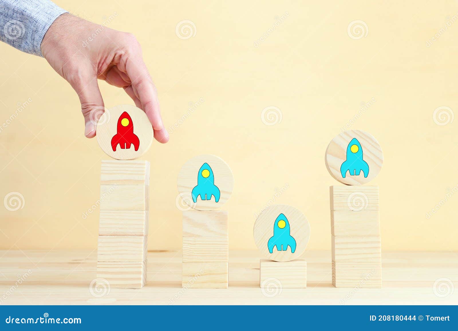 Rocket Leadership Concept. Male Hand Picking the Leader Stock Photo ...