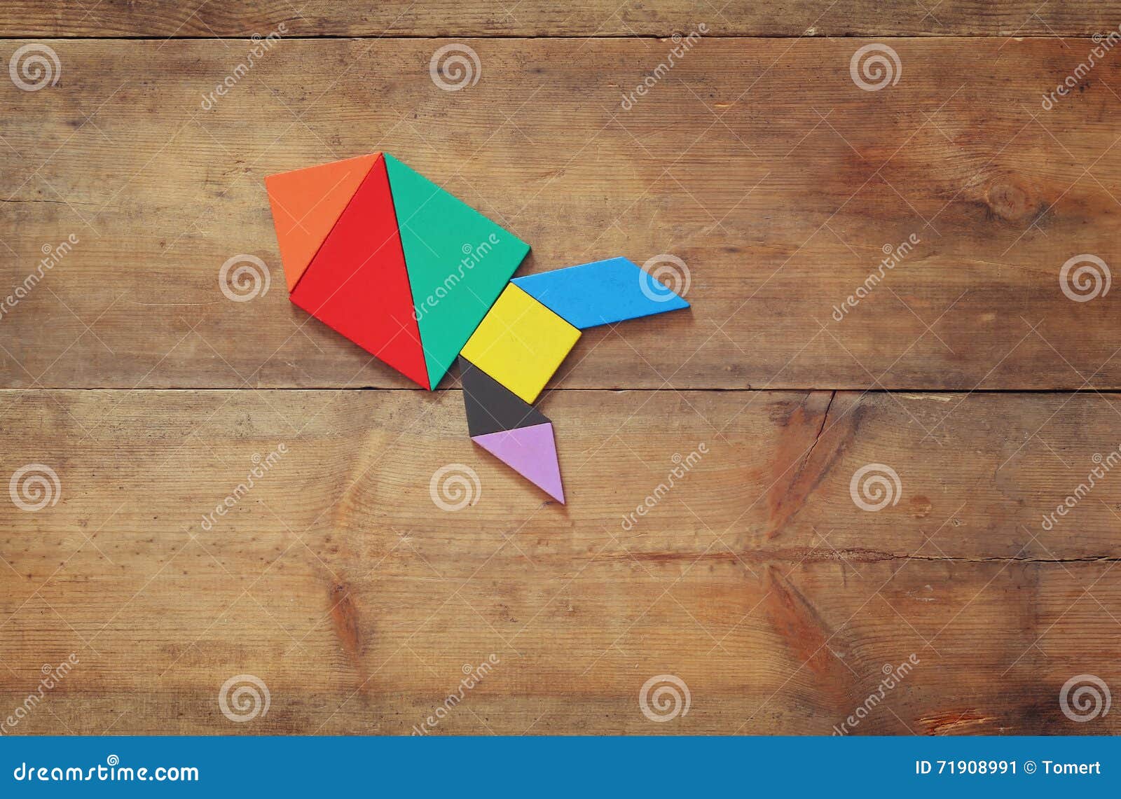 Tangram Puzzle In Home Shape On Green Grass Background Stock Photo ...