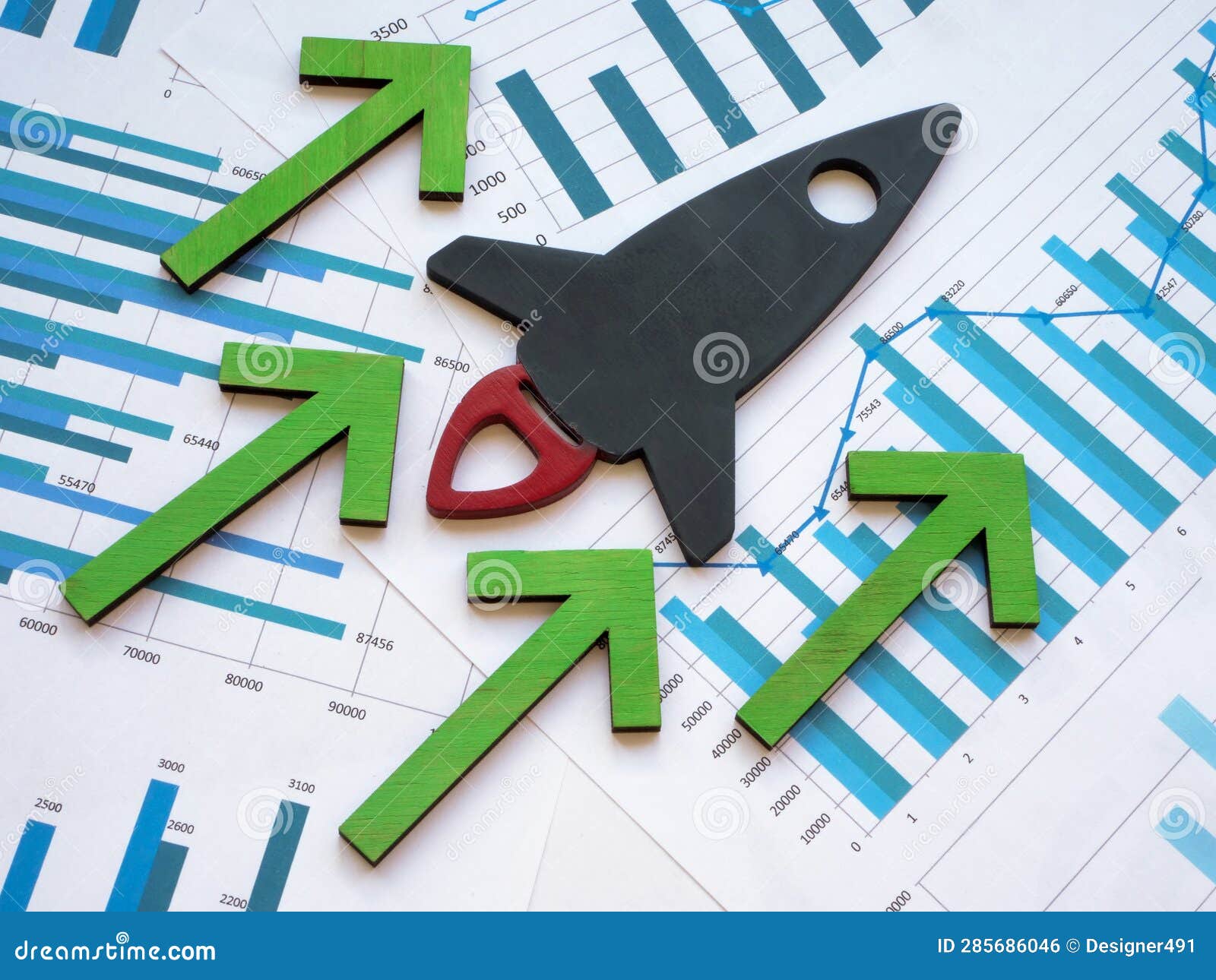Rocket and Rising Arrows on Business Charts. Stock Photo - Image of ...