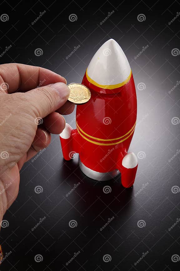 Rocket shape coin box stock image. Image of deposit, concept - 84483067