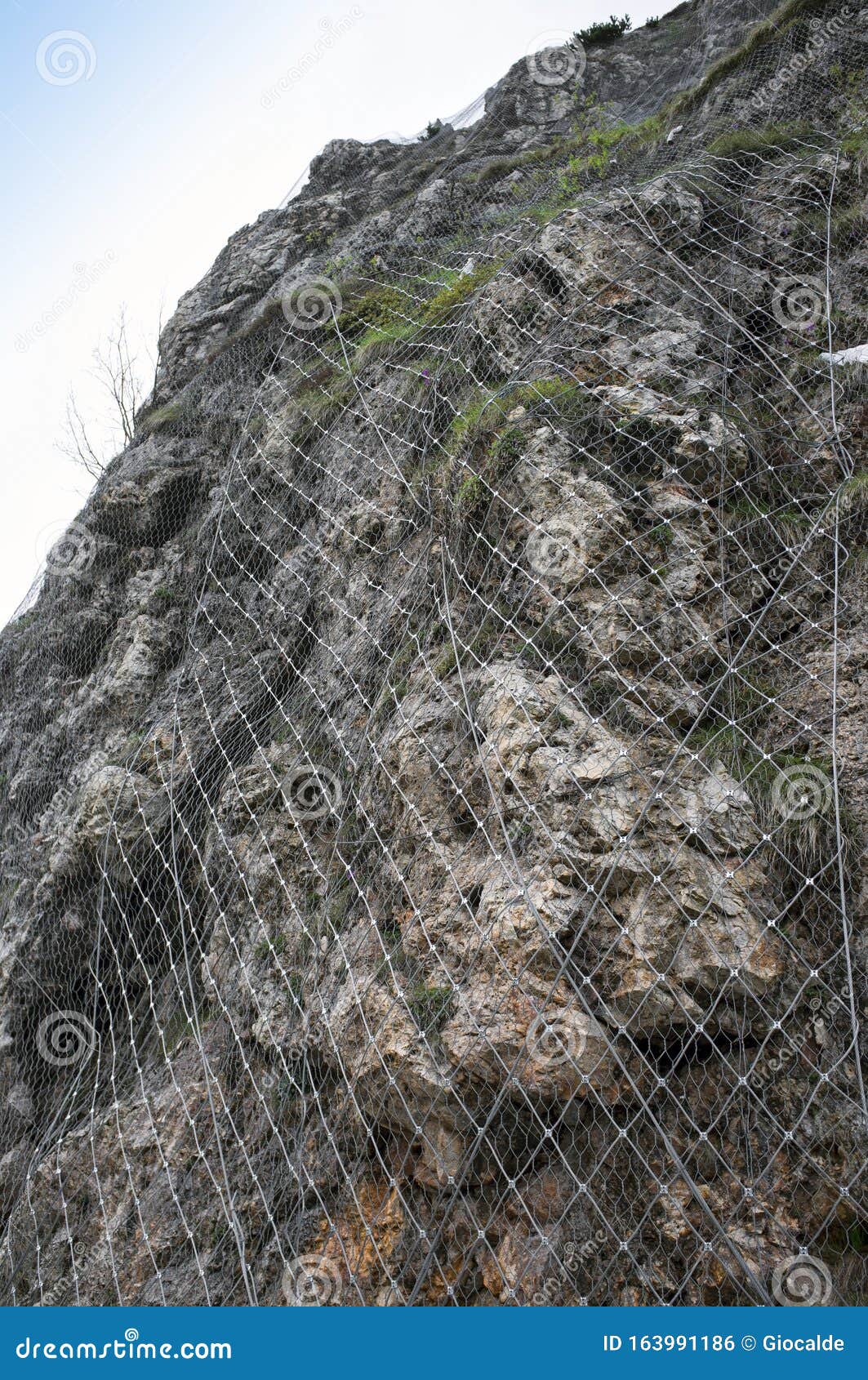 Rockfall protection nets stock photo. Image of prevention - 163991186