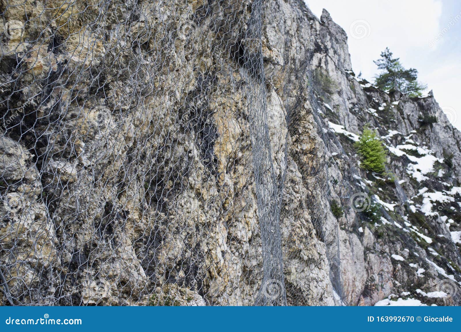 Rockfall protection nets stock photo. Image of access - 163992670