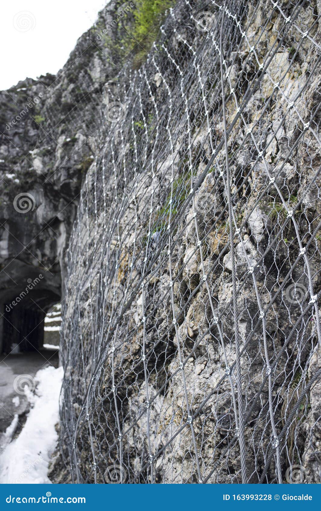 Rockfall protection nets stock photo. Image of wall - 163993228