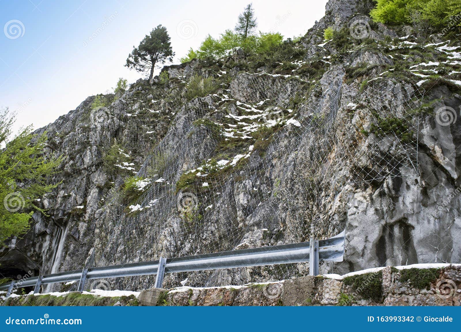 Rockfall protection nets stock photo. Image of safety - 163993342