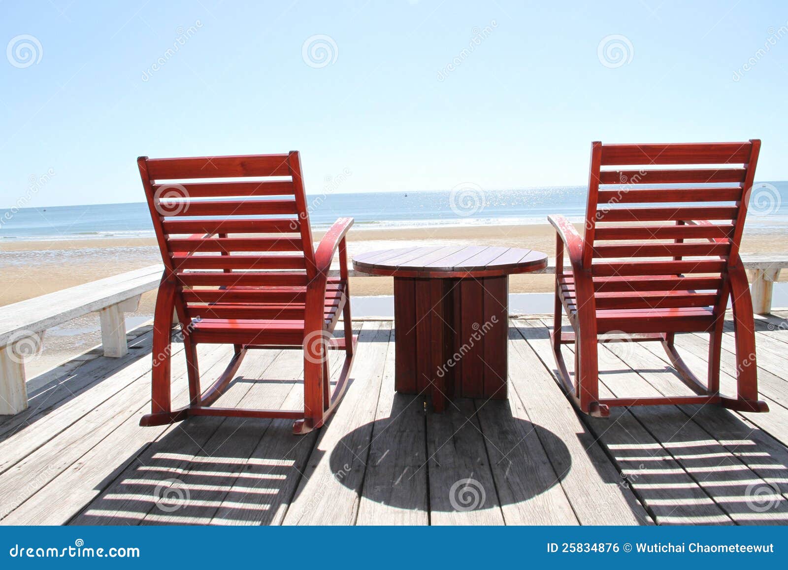 Rocking Chair on the beach stock photo. Image of leisure - 25834876
