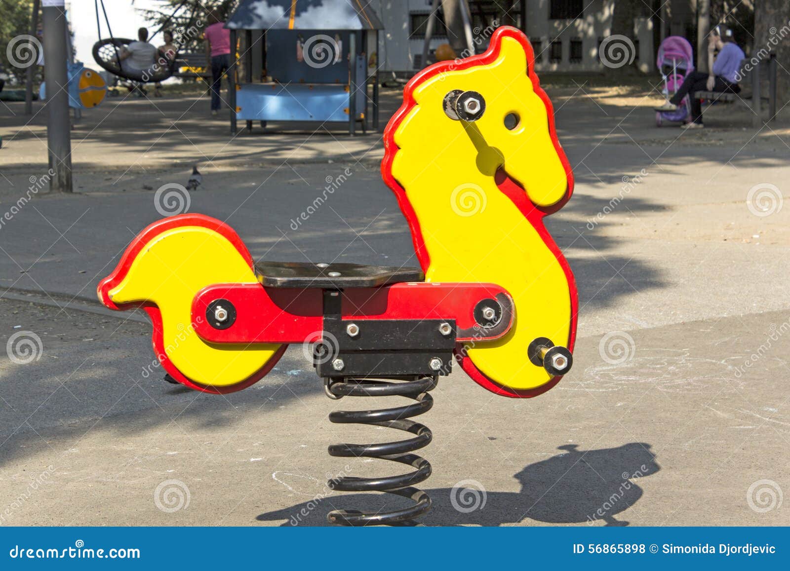Rocking horse in the park stock photo. Image of seat - 56865898