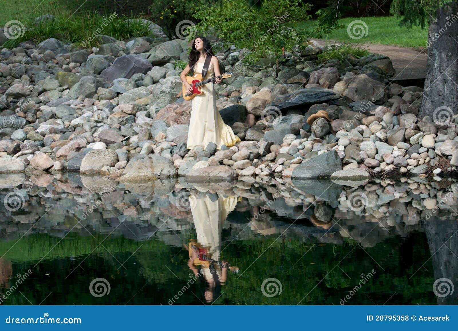 Rocking out on guitar stock photo. Image of pond, beautiful - 20795358