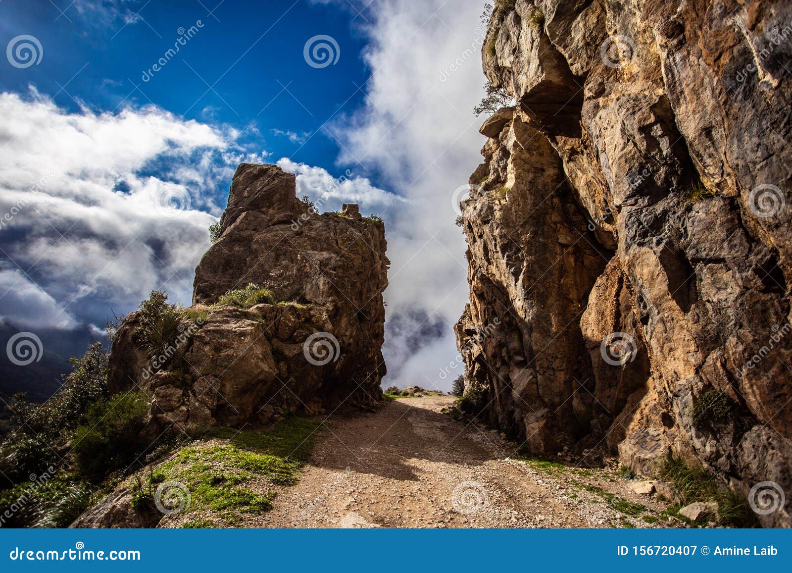 Rock road stock image. Image of mountain, clouds, rockroad - 156720407