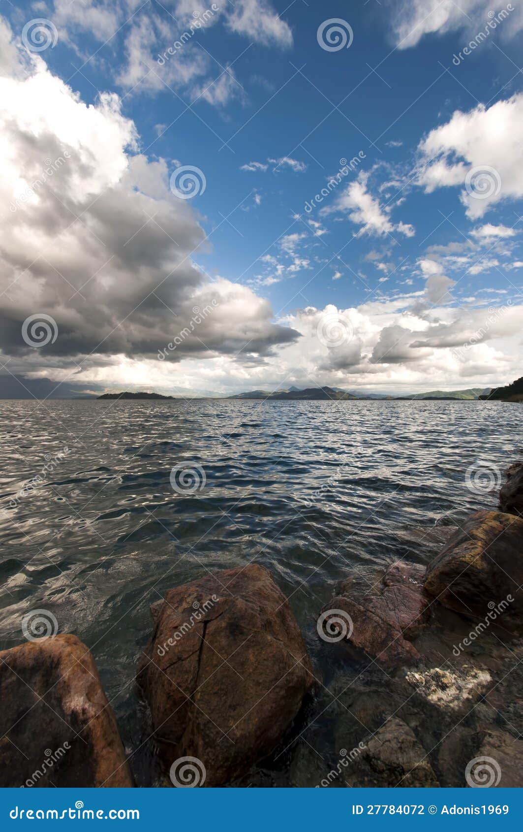Rocks along lake shore stock photo. Image of outdoors - 27784072