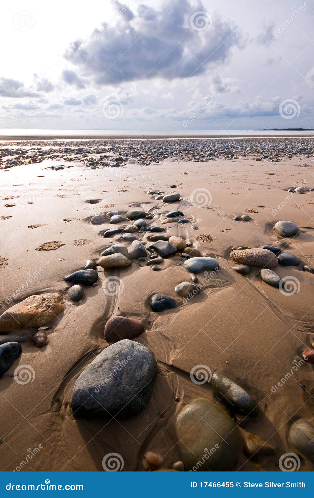 Rocks on the beach stock image. Image of sand, ripples - 17466455