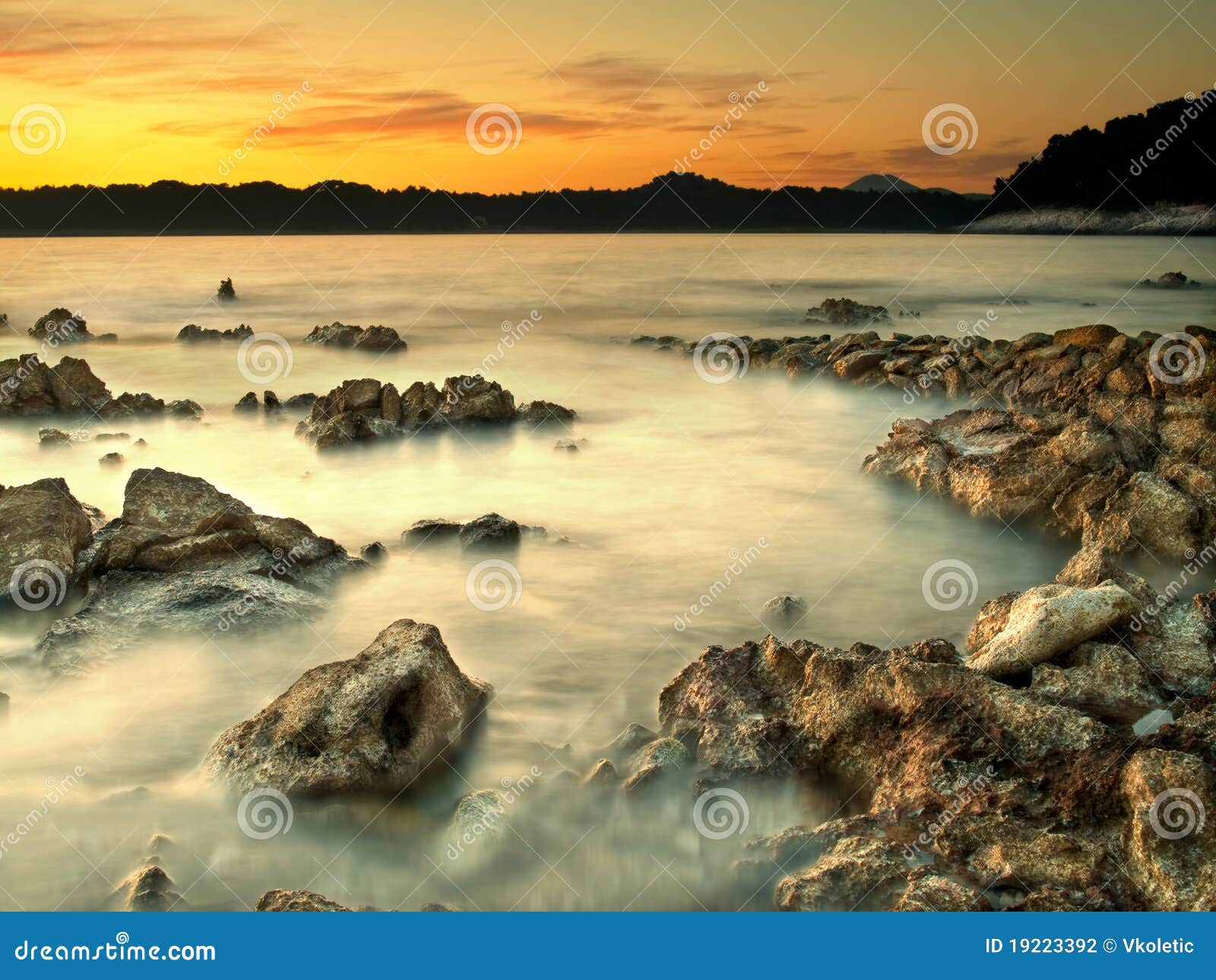 Rocks on the beach stock photo. Image of seacoast, coastline - 19223392