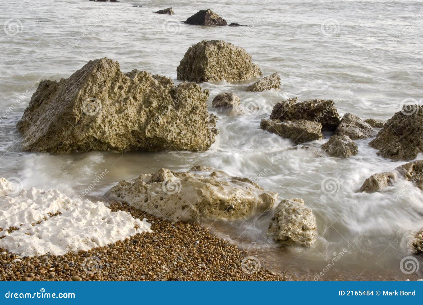 Rocks on the beach stock photo. Image of outdoors, seaside - 2165484